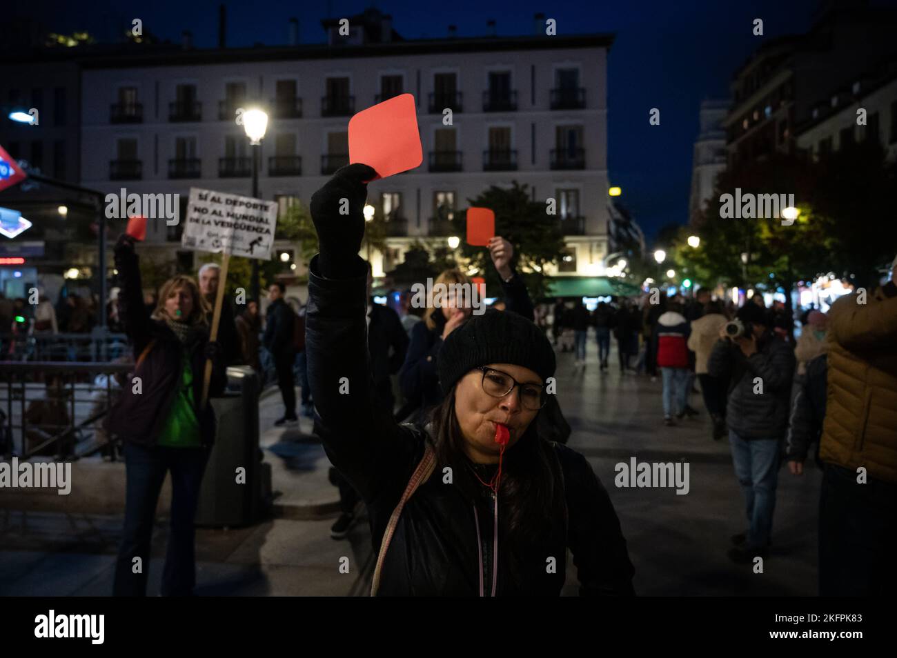 Madrid, Spain. 19th Nov, 2022. People raising red cards while blowing ...