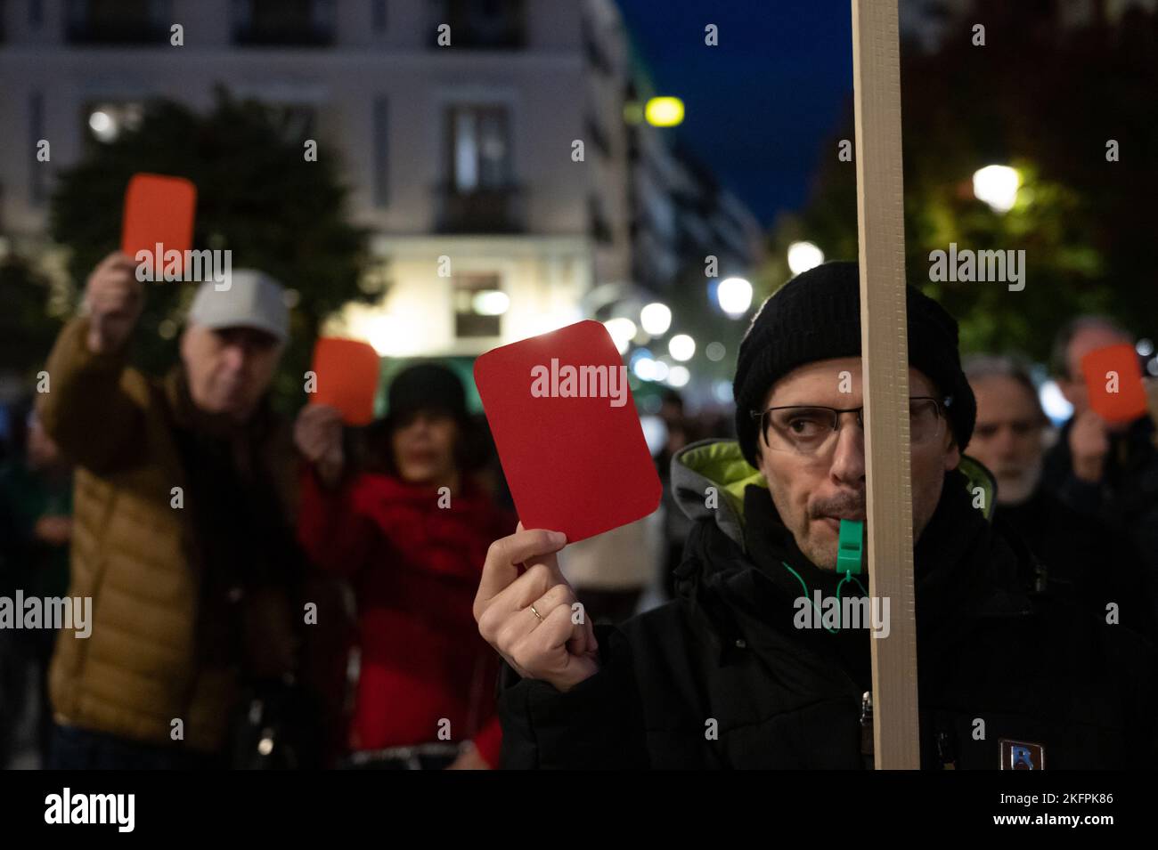 Madrid, Spain. 19th Nov, 2022. People raising red cards while blowing ...