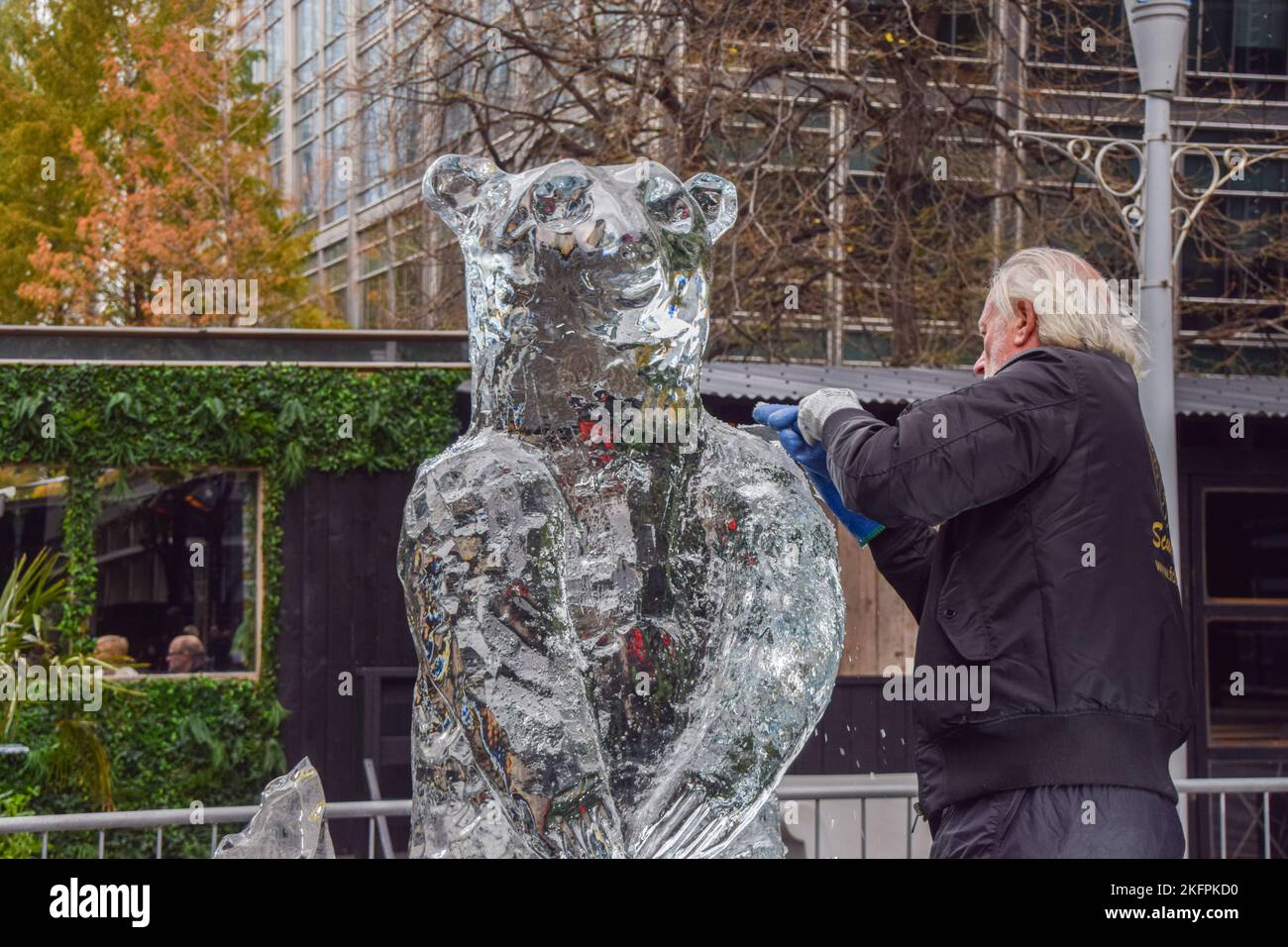 London, UK. 19th November 2022. A sculptor puts the finishing touches ...