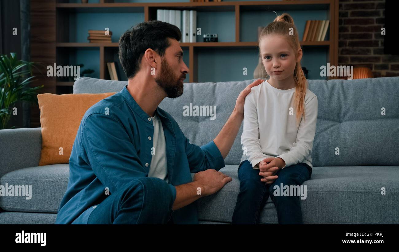 Loving caring father dad babysitter parent apologize to offended daughter girl at home ...