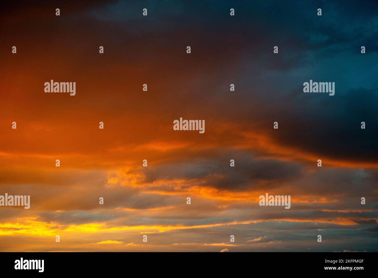 Dramatic golden sunset sky over hi-res stock photography and images - Alamy