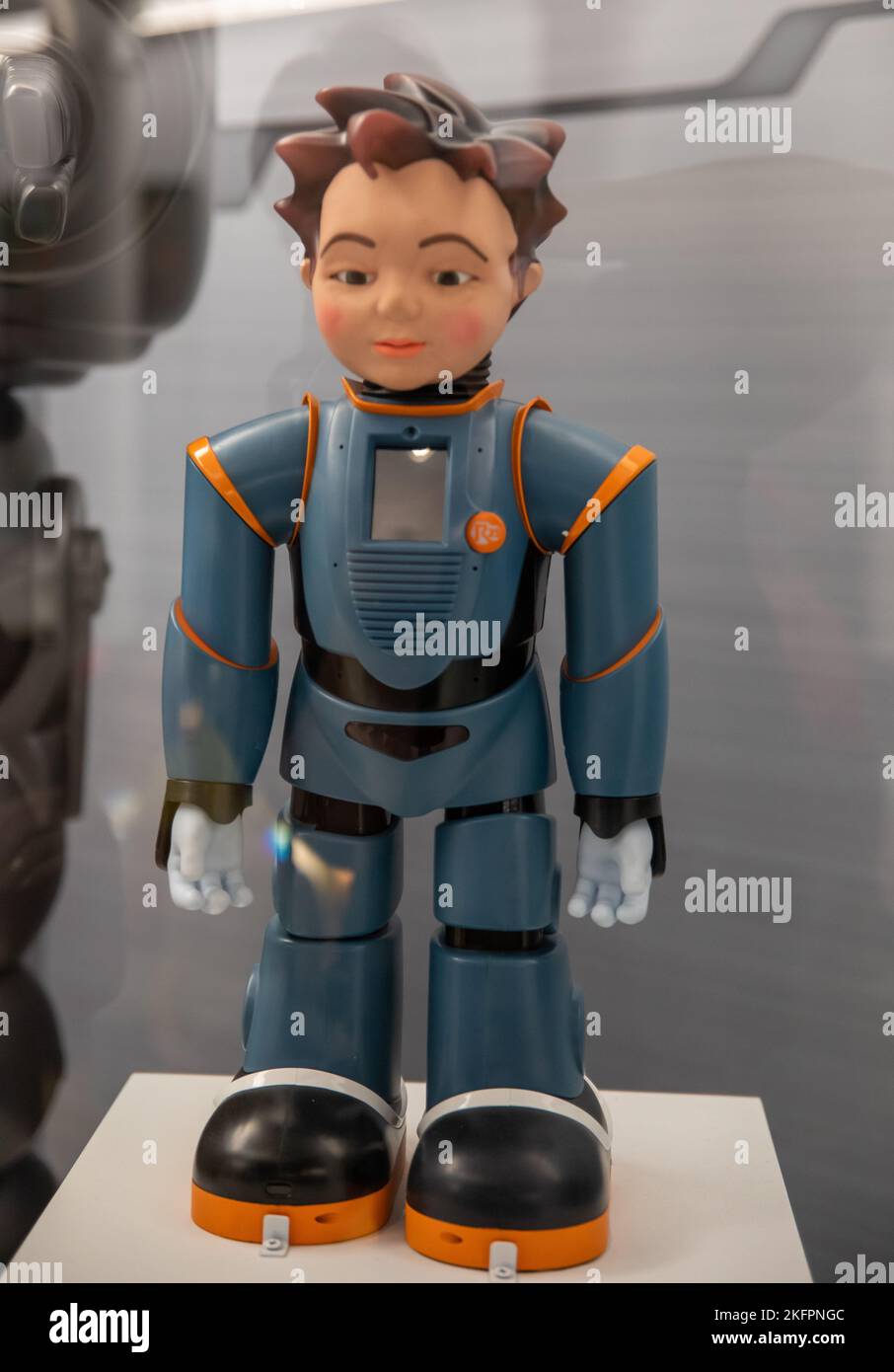 A vertical closeup of the Zeno robot made to help children with autism ...