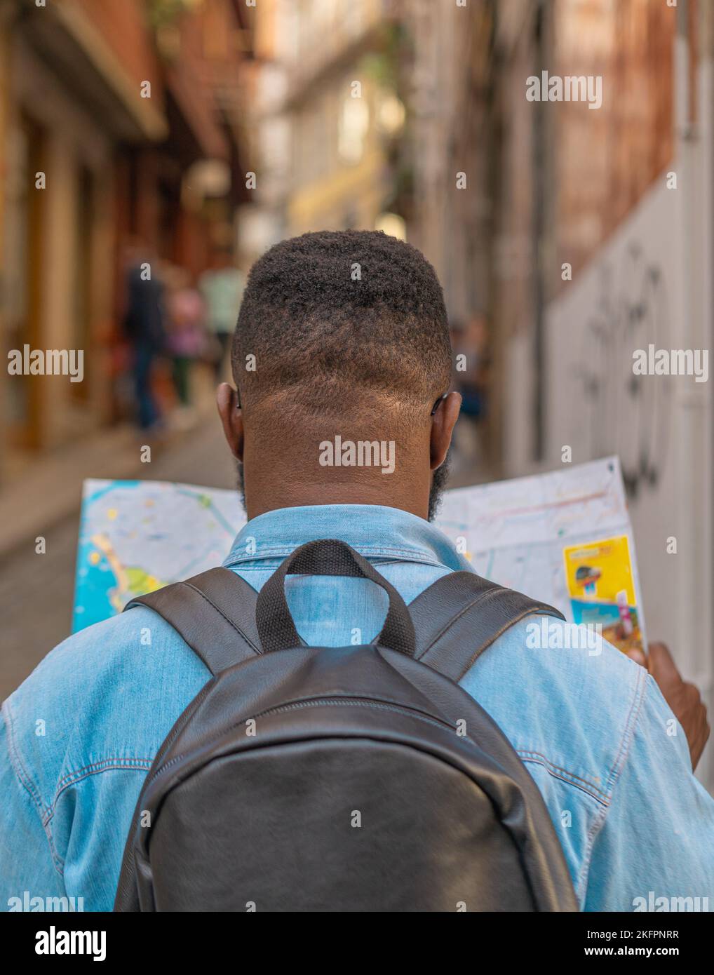 View from behind man backpack hi-res stock photography and images - Alamy