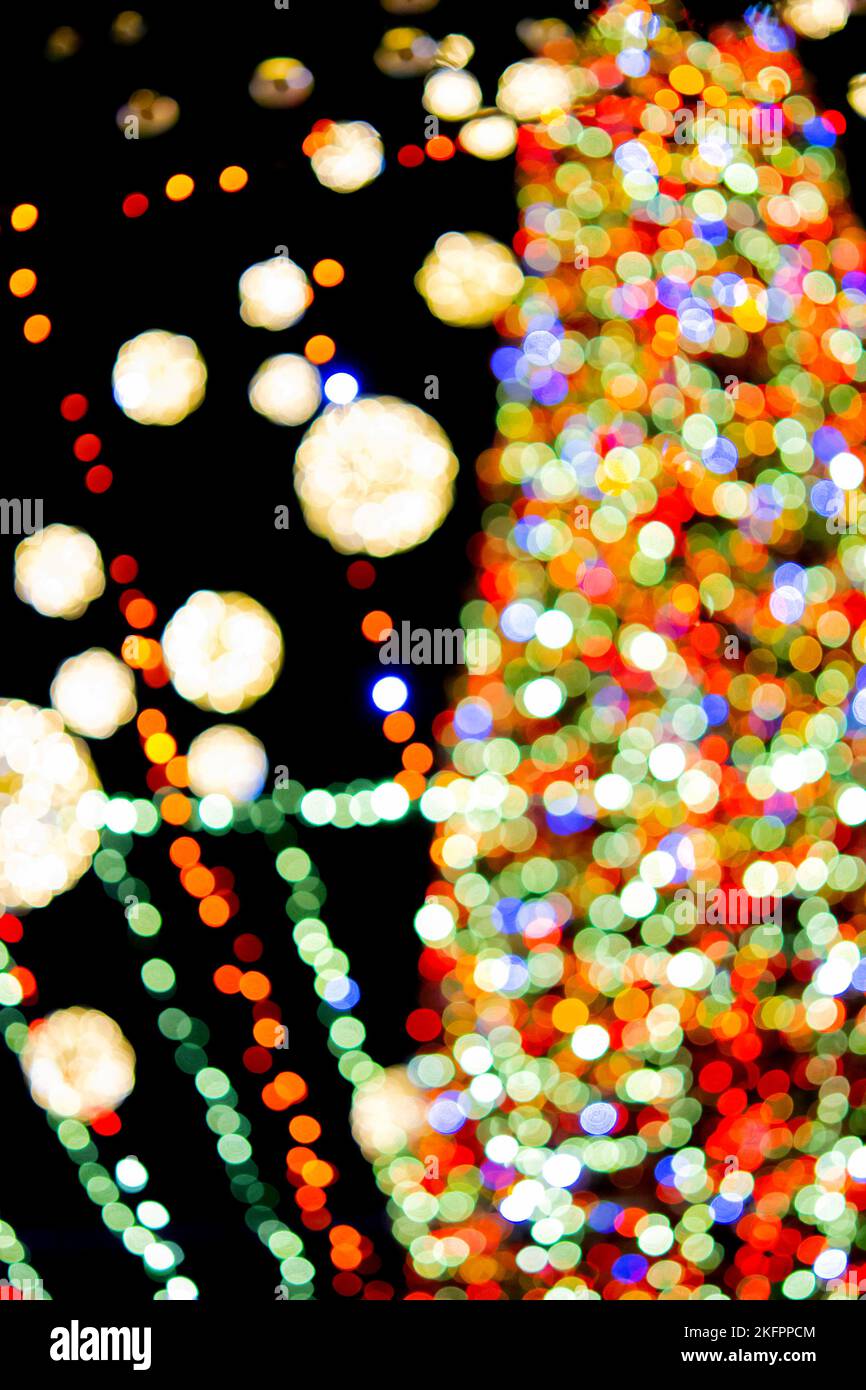 New Year's Christmas tree decorated with luminous multi-colored ...