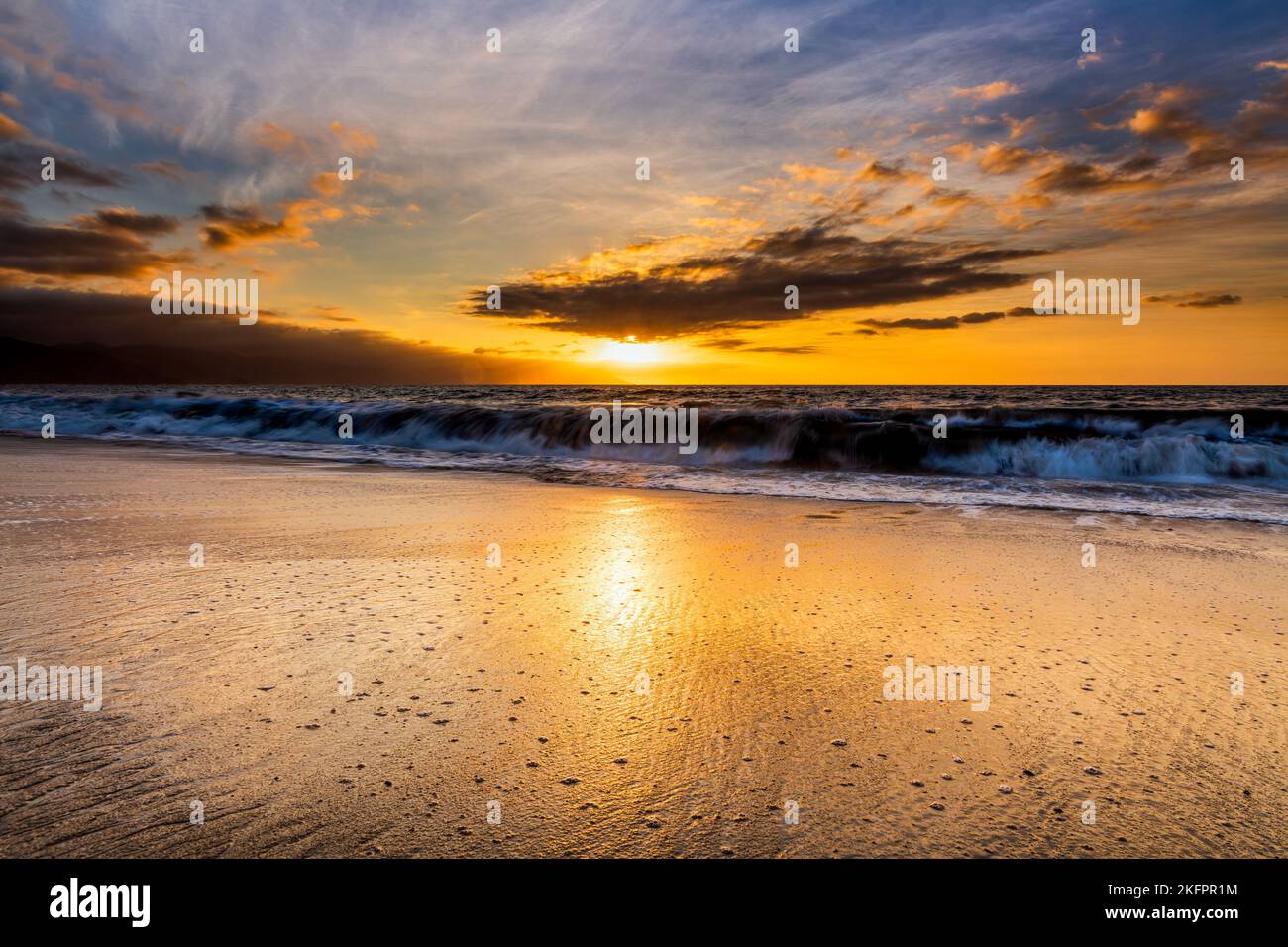 A Beautiful Colorful Orange Colored Ocean Sunset With Light Reaction On ...