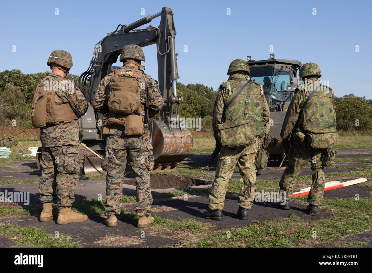 U.S. Marines with Marine Wing Support Squadron 172 and members of the ...