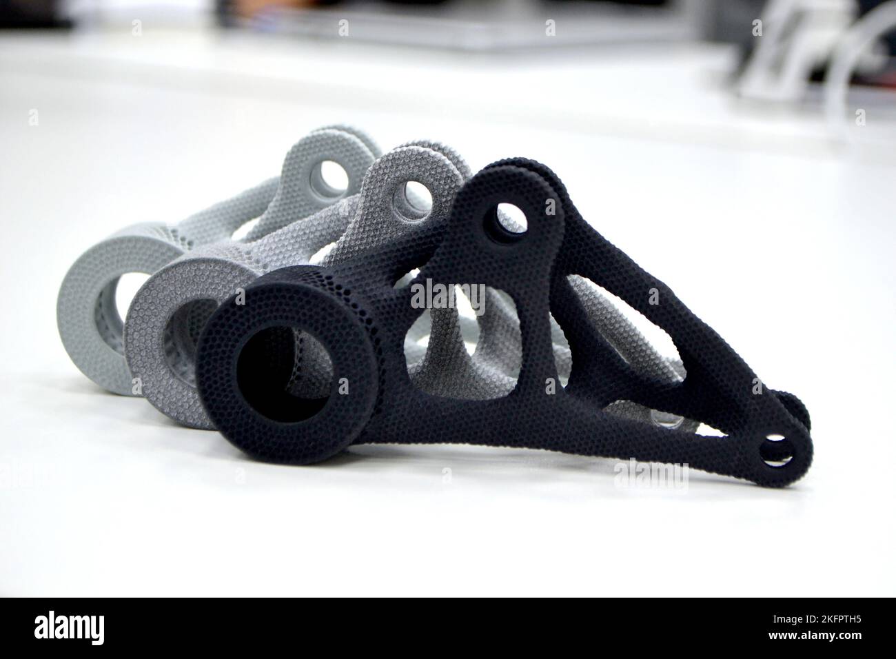Black white gray models printed on 3D printer in laboratory office ...