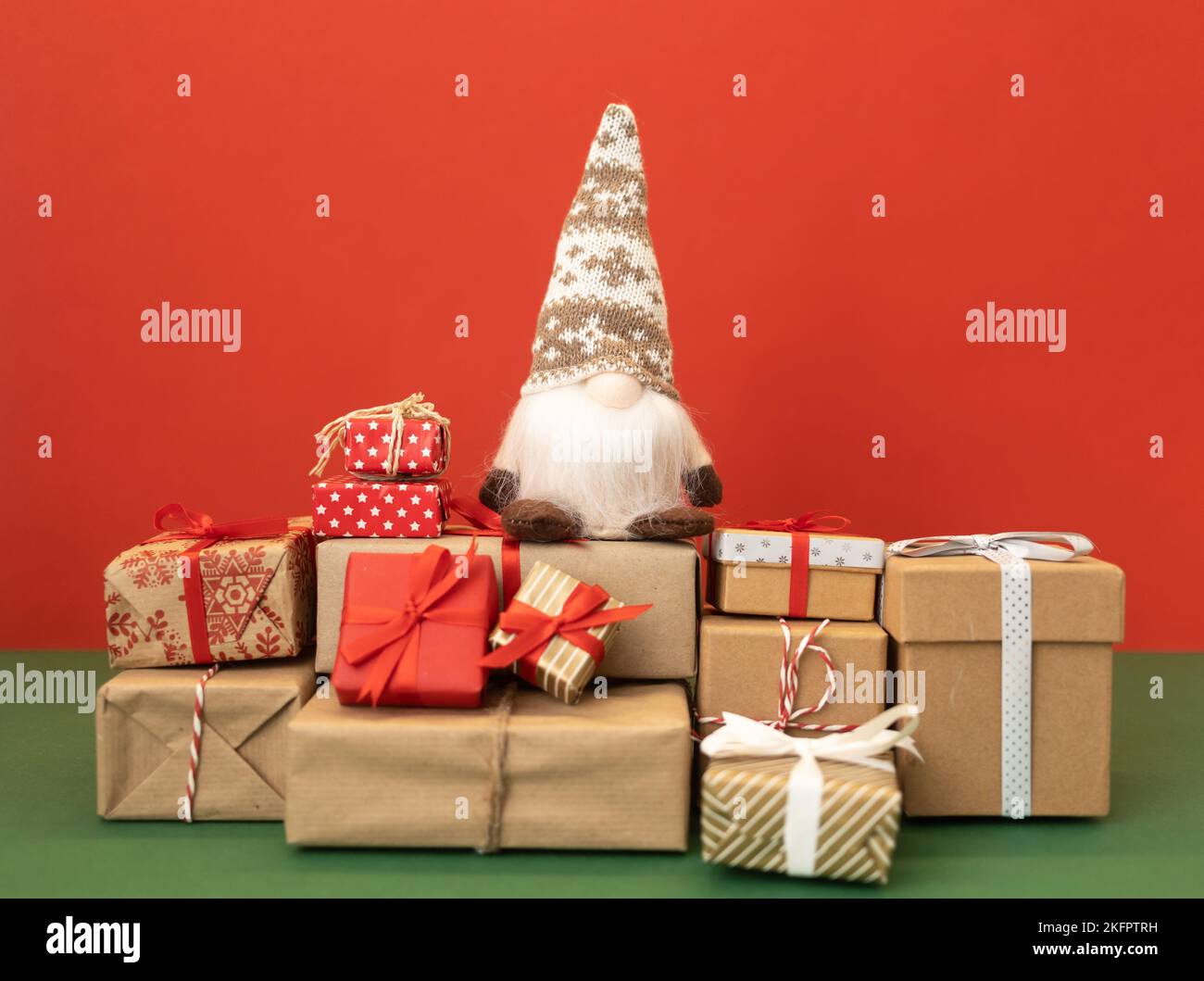 christmas gnome gonk on the craft wrapped gifts Stock Photo - Alamy