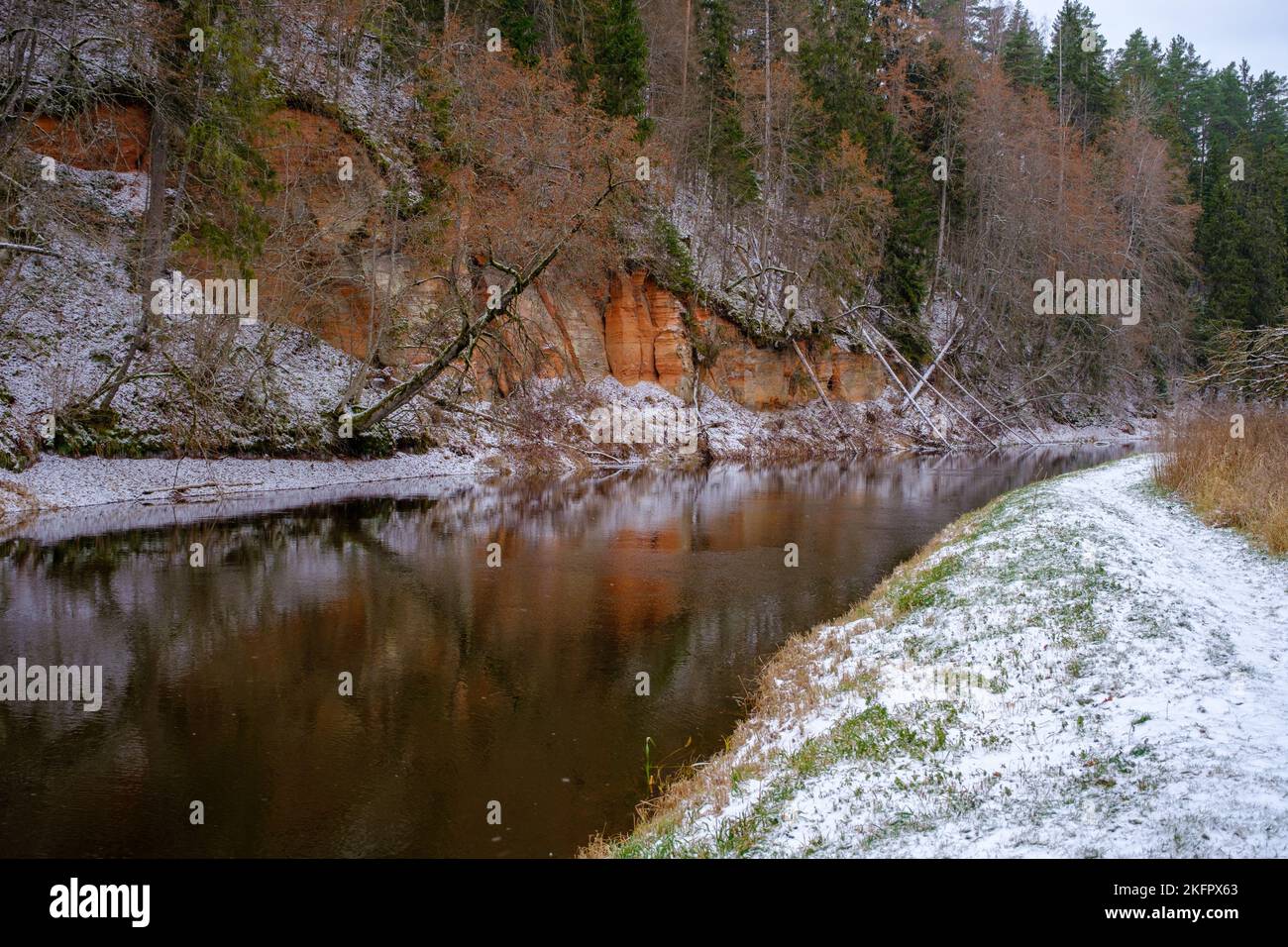 The river Salaca is meandered by high sandstone cliffs. Skanaiskalns ...