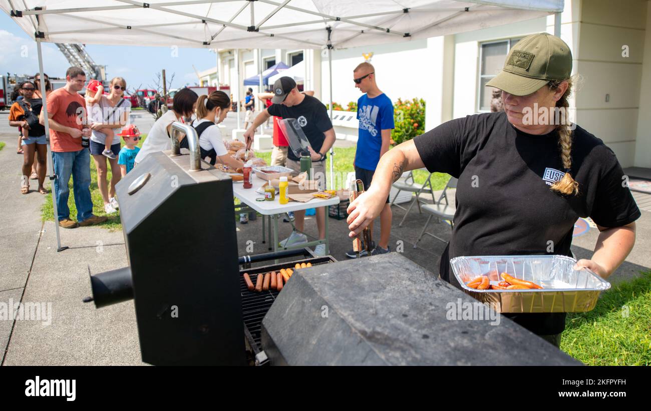 Airmen, assigned to the 18th Civil Engineer Squadron, and USO Kadena ...