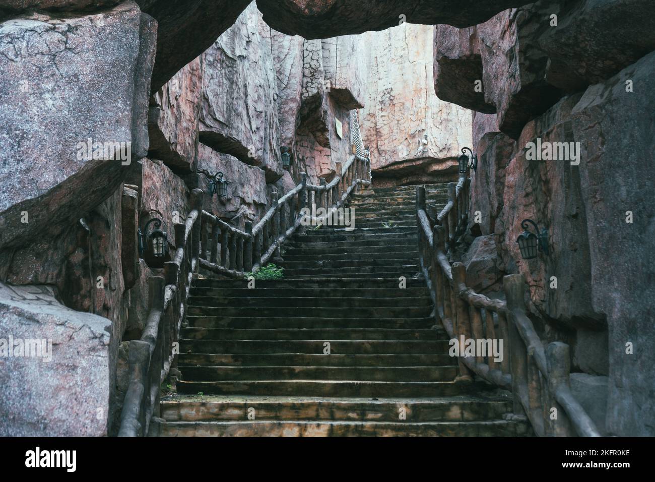 A stone steps trail in a mountainous area, with stone walls Stock Photo ...