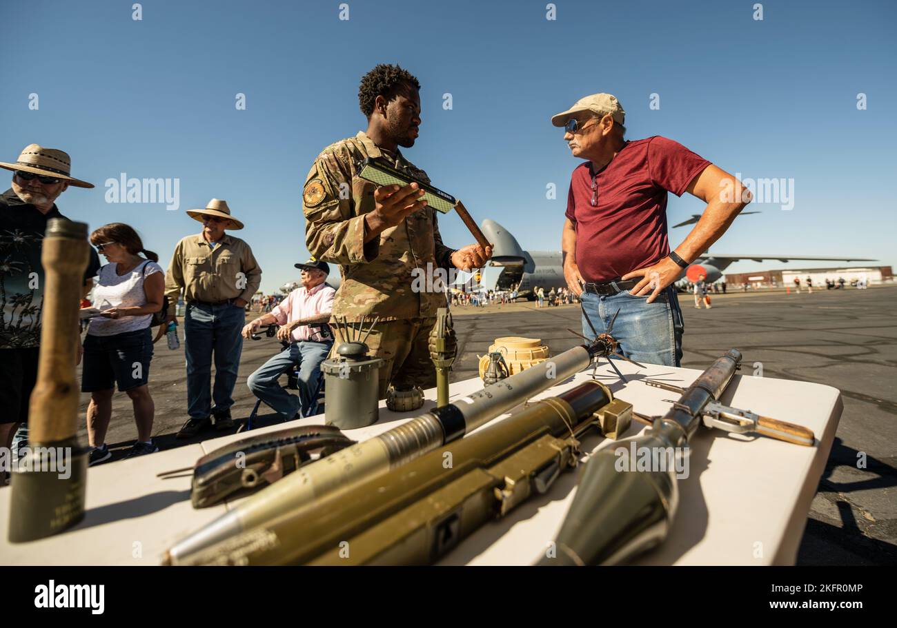 U.S. Air Force Senior Airman Johnny Aristide, center, 60th Civil ...