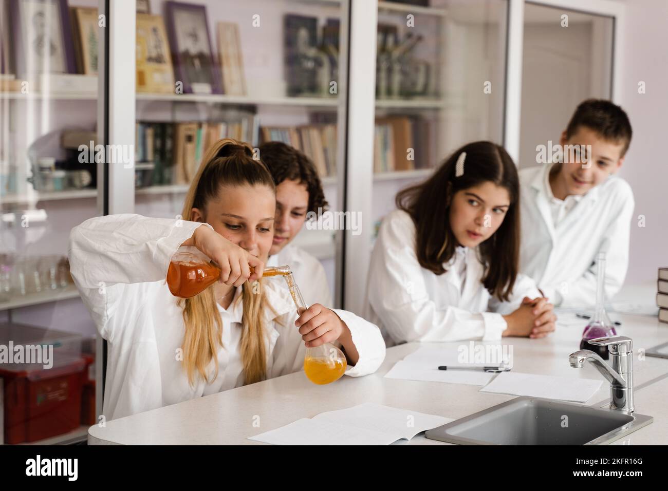 Education. Chemical experiments at a chemistry lesson at school ...