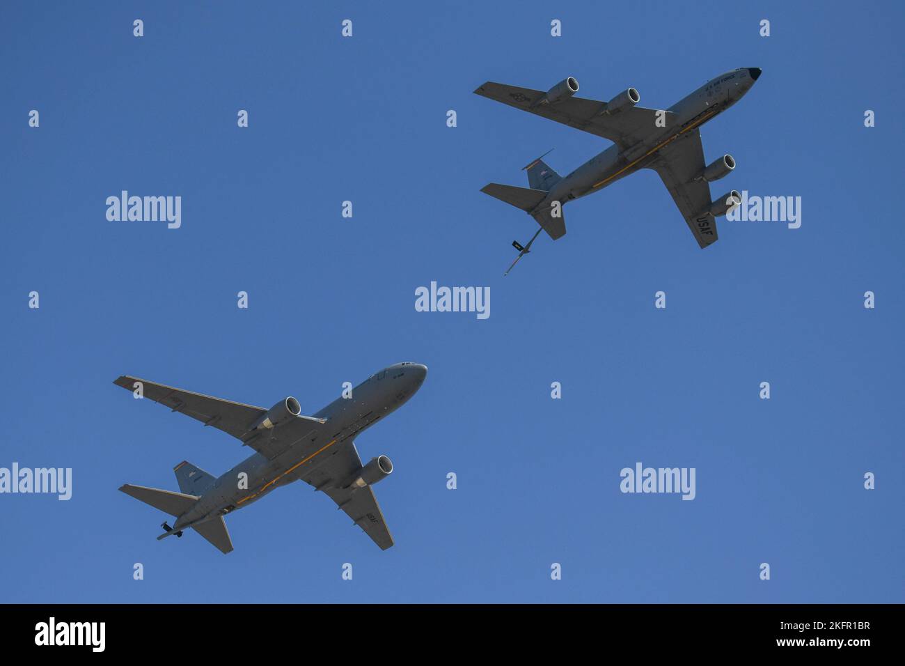 A KC-135 Stratotanker holds a refueling position with a KC-46 Pegasus during a flyover at the ...