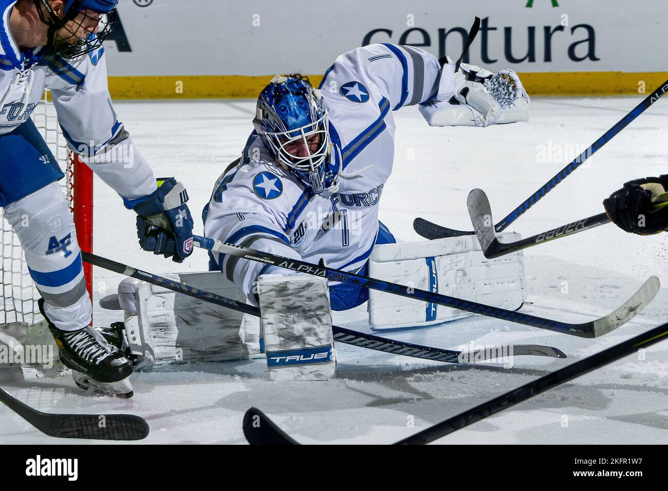 U.S. Air Force Academy -- Air Force's Guy Blessing blocks a shot from ...