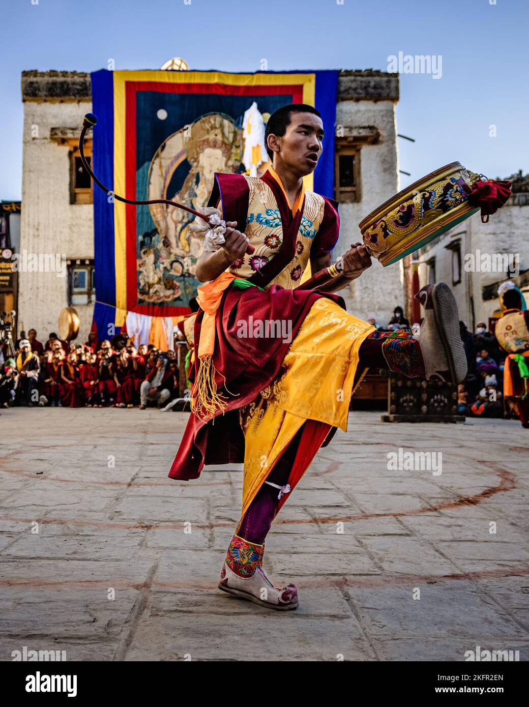 A Tibetan Buddhist in traditional outfit performing Ritual Dance at the ...