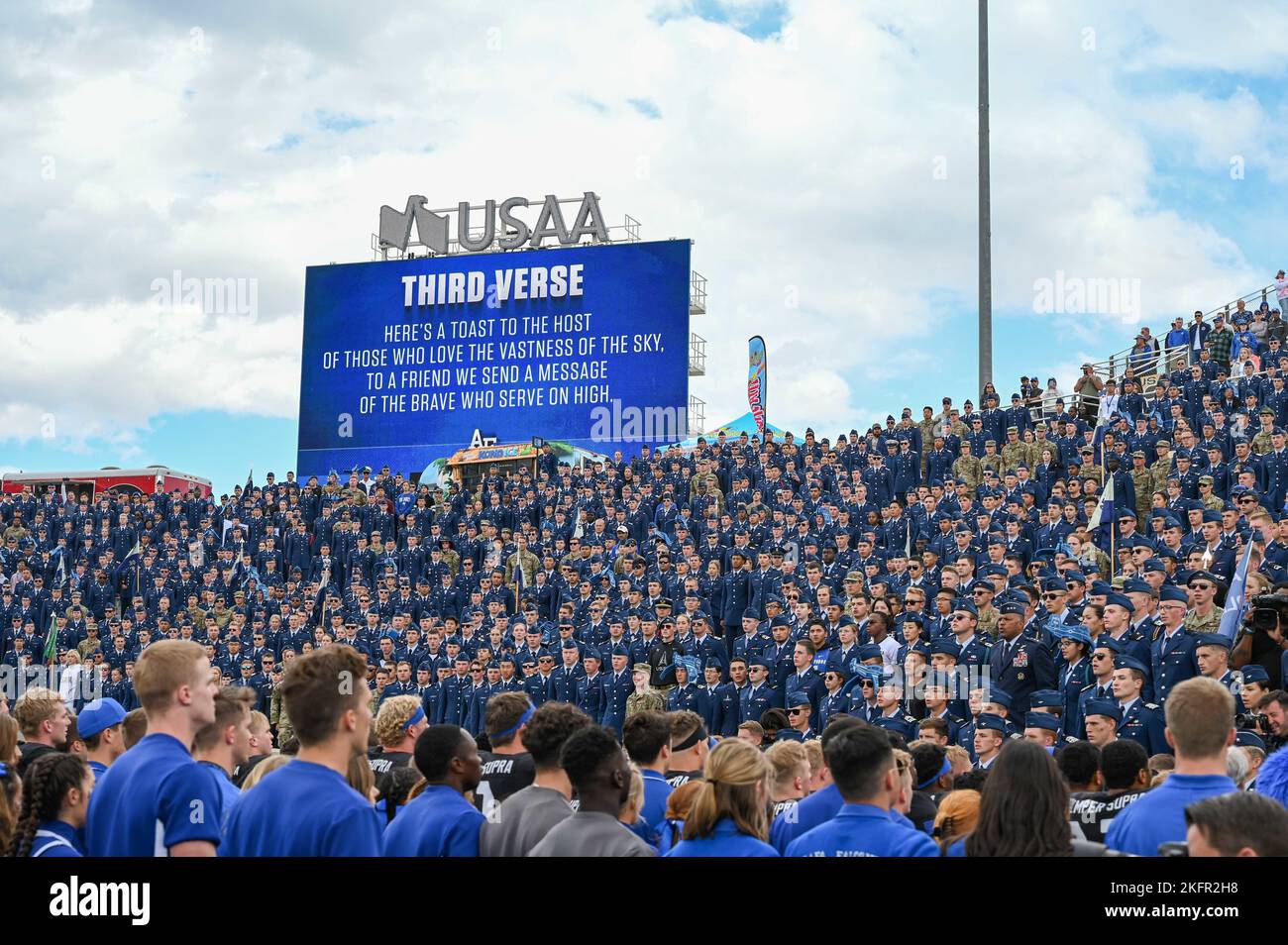 U.S. Air Force Academy cadets and football game spectators sing the Air ...