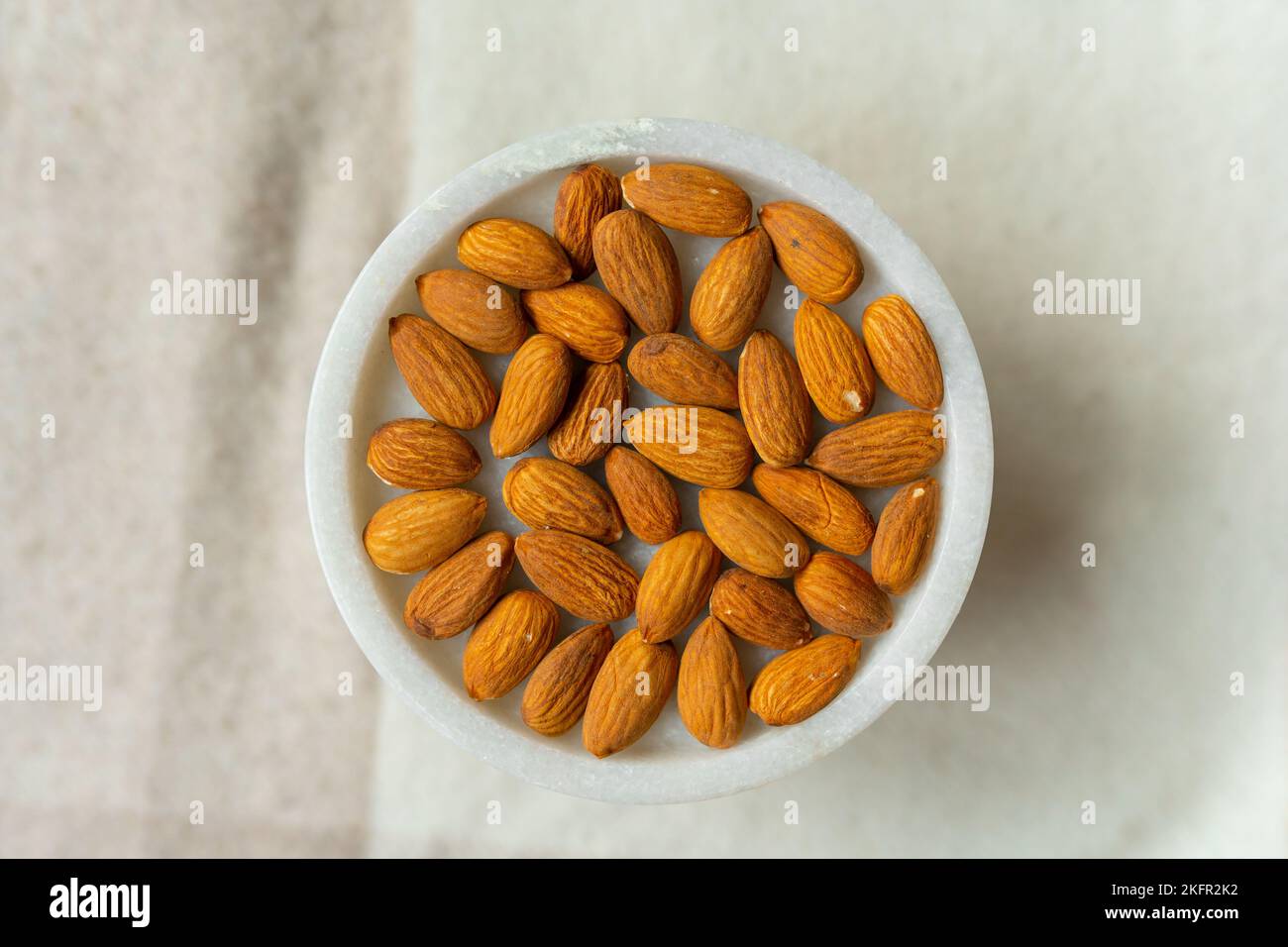 Close-up of almonds on a beautiful stand, Nuts are healthy. Organic ...