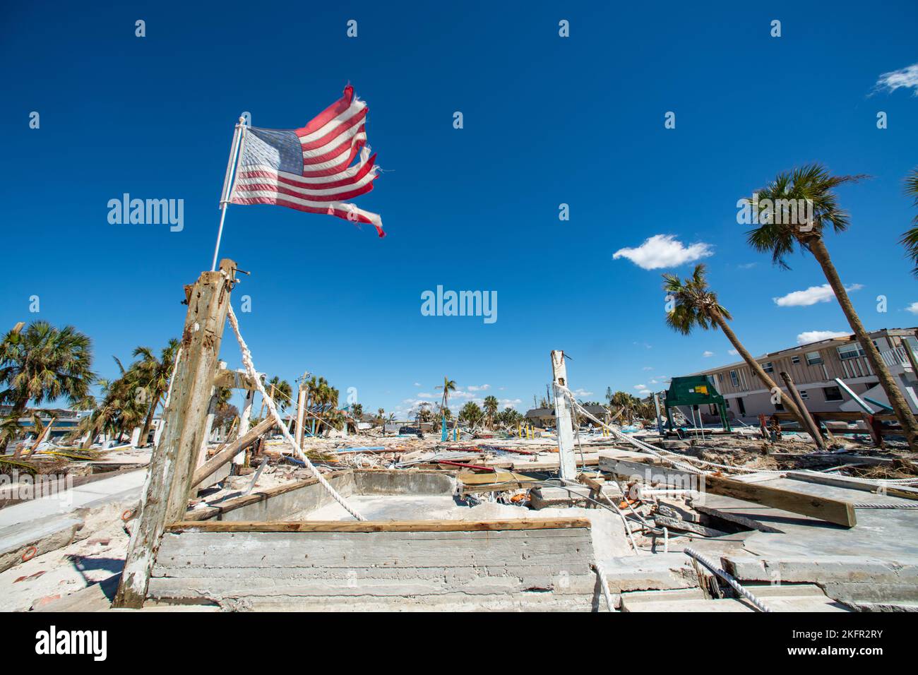 The American flag stands in the wake of Hurricane Ian, Forty Myers ...