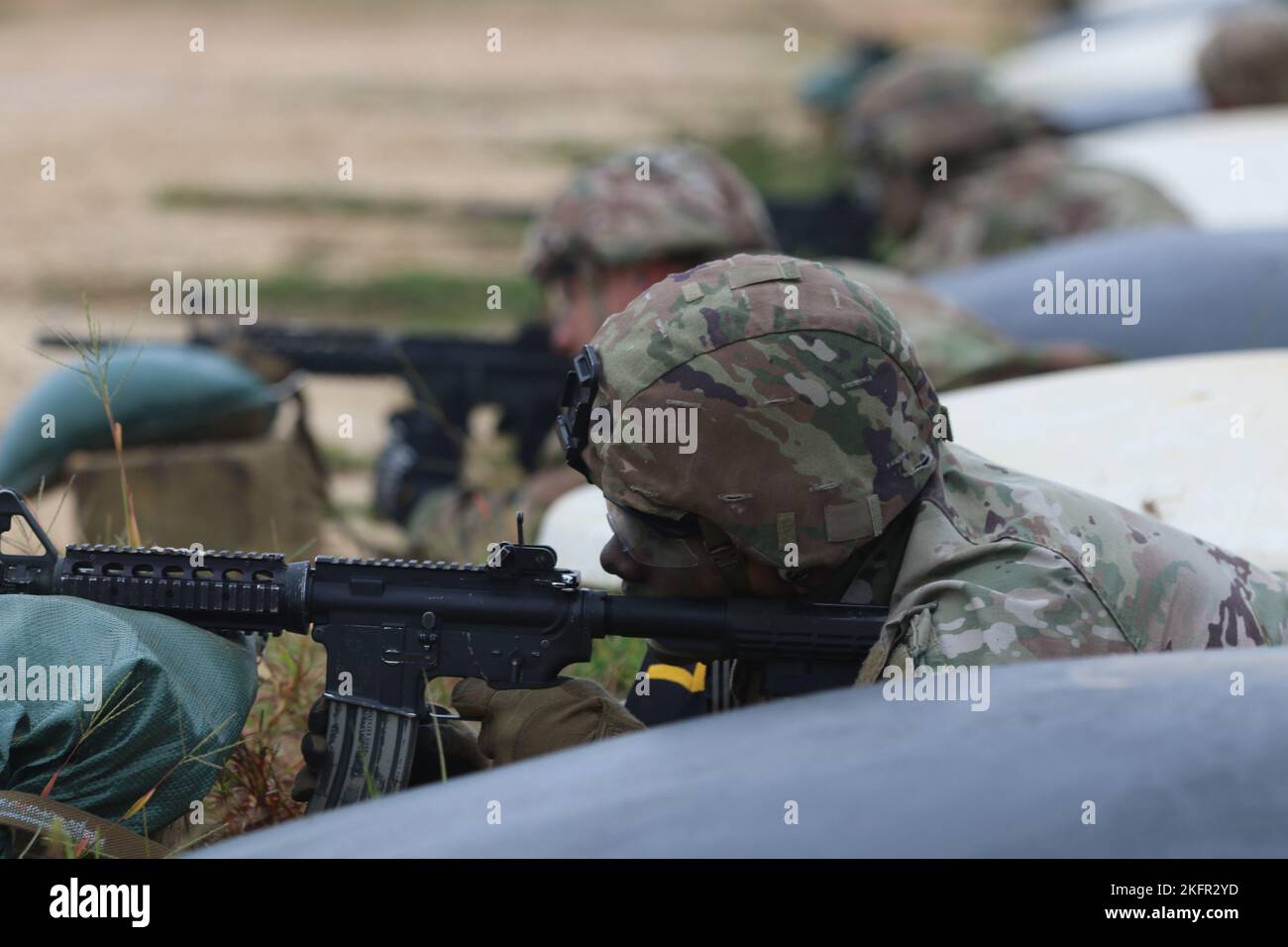 Soldiers of Squad 7, United States Army Reserves, participate in a zero ...