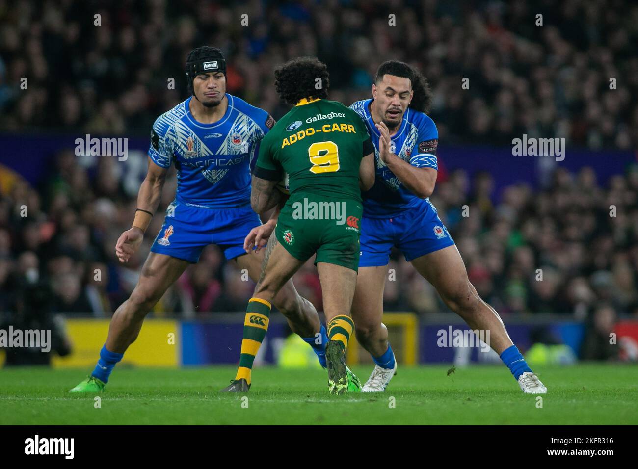 Manchester, UK. 19th Nov, 2022. Josh Addo-Carr is tackled by the Samoan ...