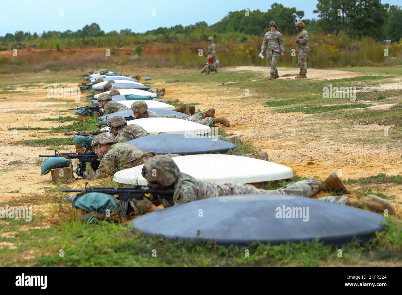 U.S. Army Best Squad competitors zero their M4 carbines at the range on ...