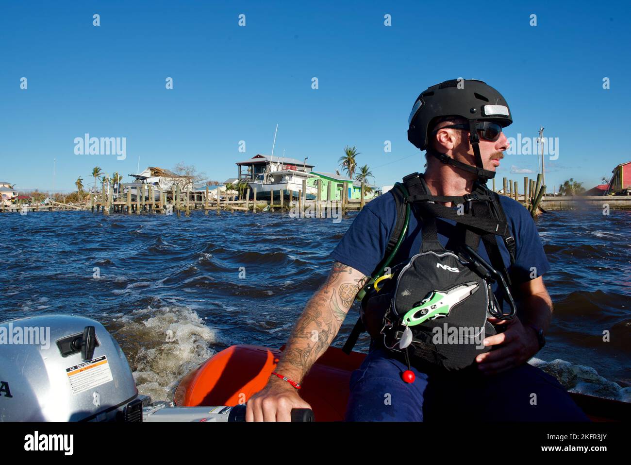 Petty Officer 1st Class Dustin Garnett, conducts rescue operations Oct ...
