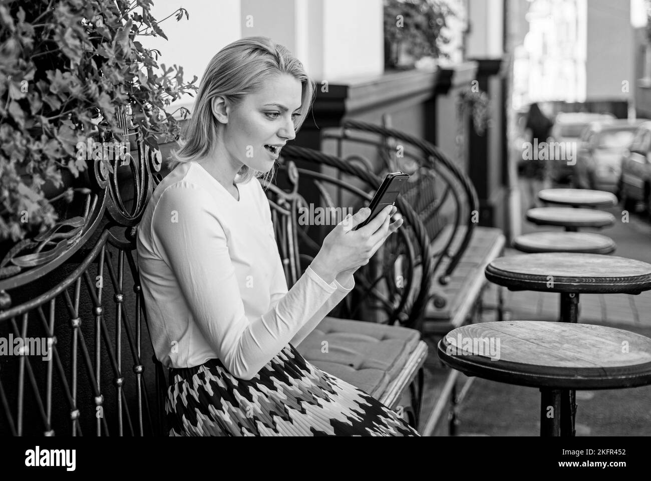 Woman enthusiastic face with smartphone create appointment in social ...