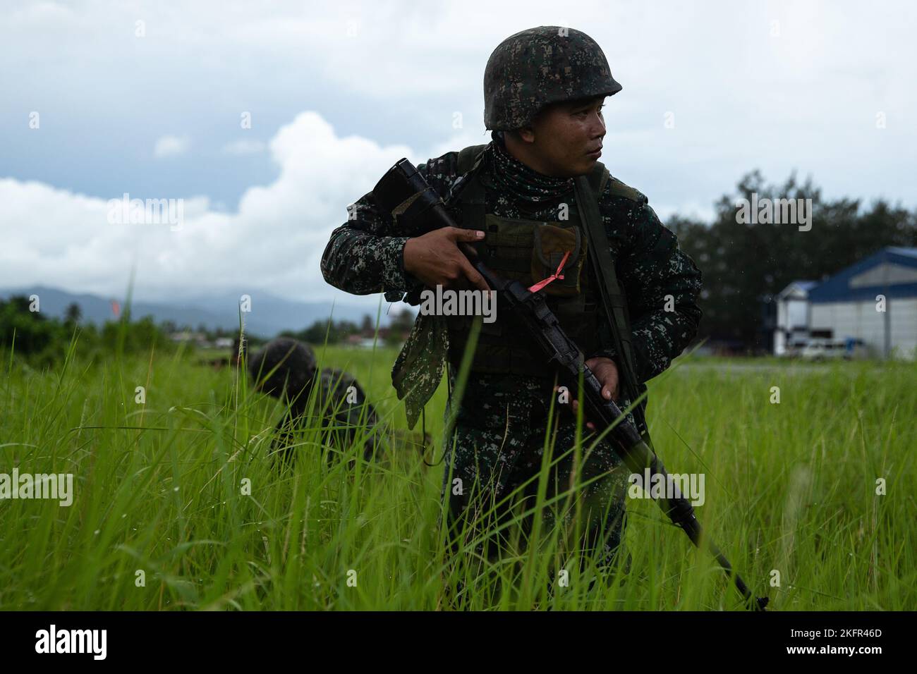 A Philippine Marine patrols during KAMANDAG 6, in San Vicente ...