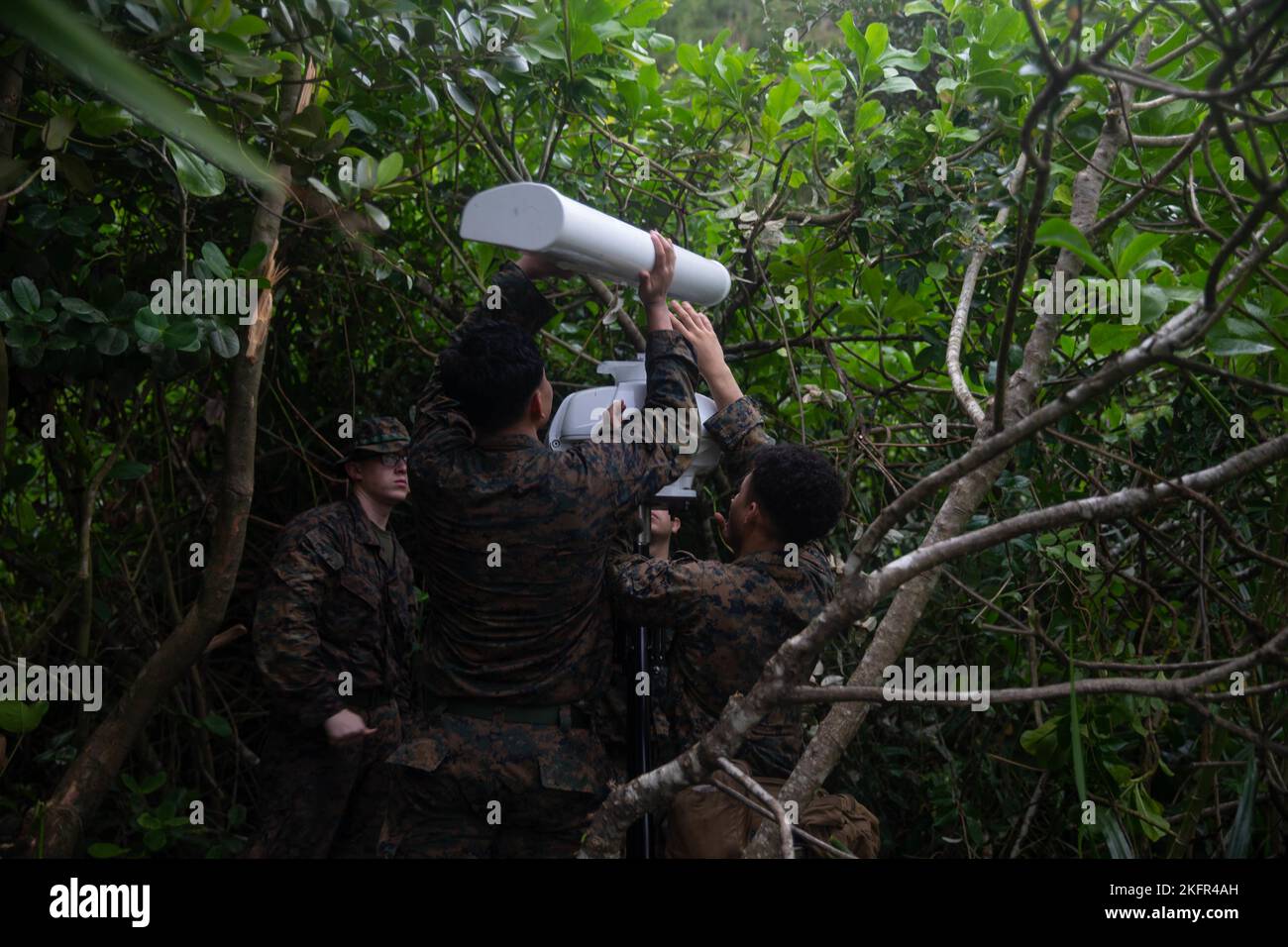 U.S. Marine Corps Lance Cpl. Jason Faine, a surveillance sensor ...