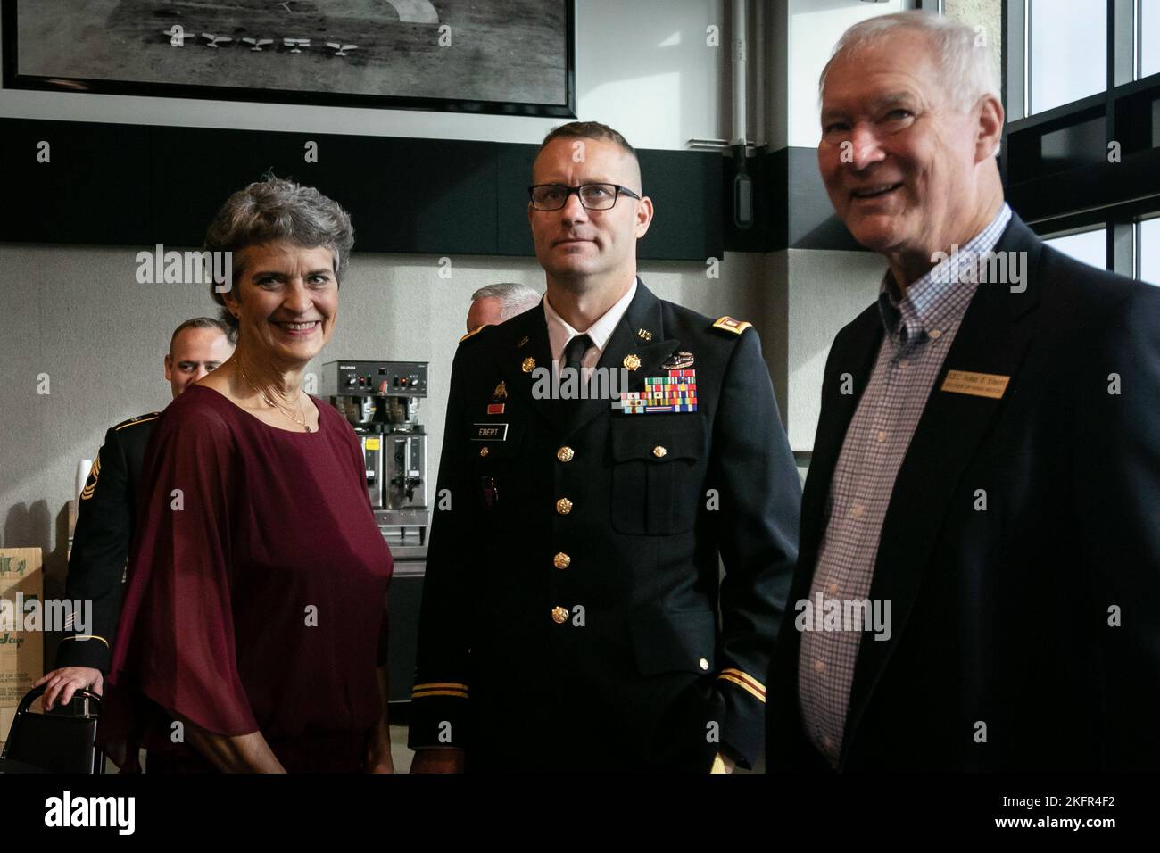 Minnesota Army National Guard's Maj. Andy Ebert stands with his parents ...