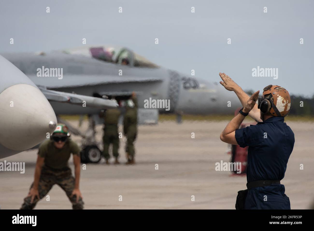 A U.S. Marine with Marine Fighter Attack Squadron (VMFA) 312, Marine ...