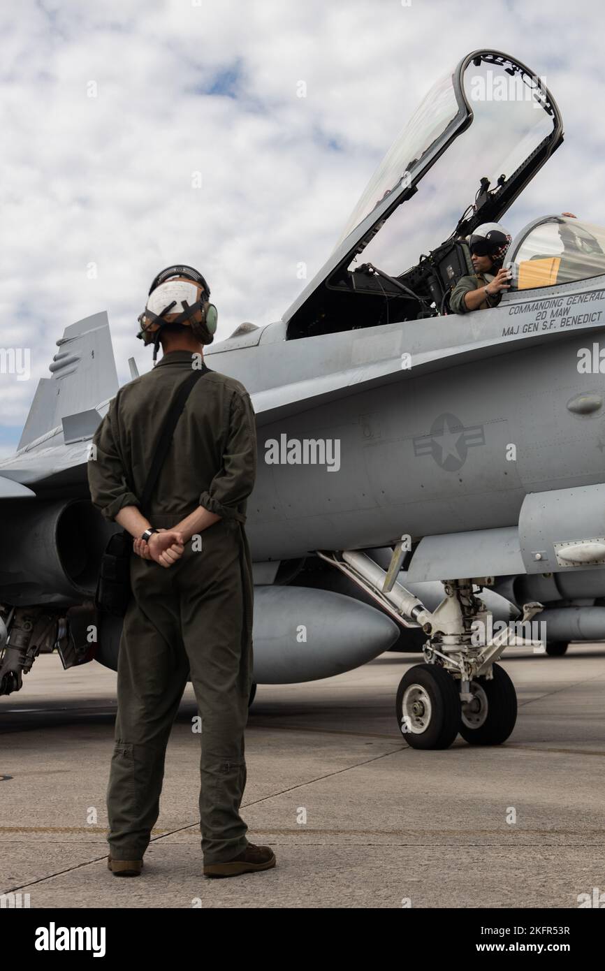 U.S. Marine Corps Capt. Kevin Williams, right, F/A-18 pilot, Marine ...