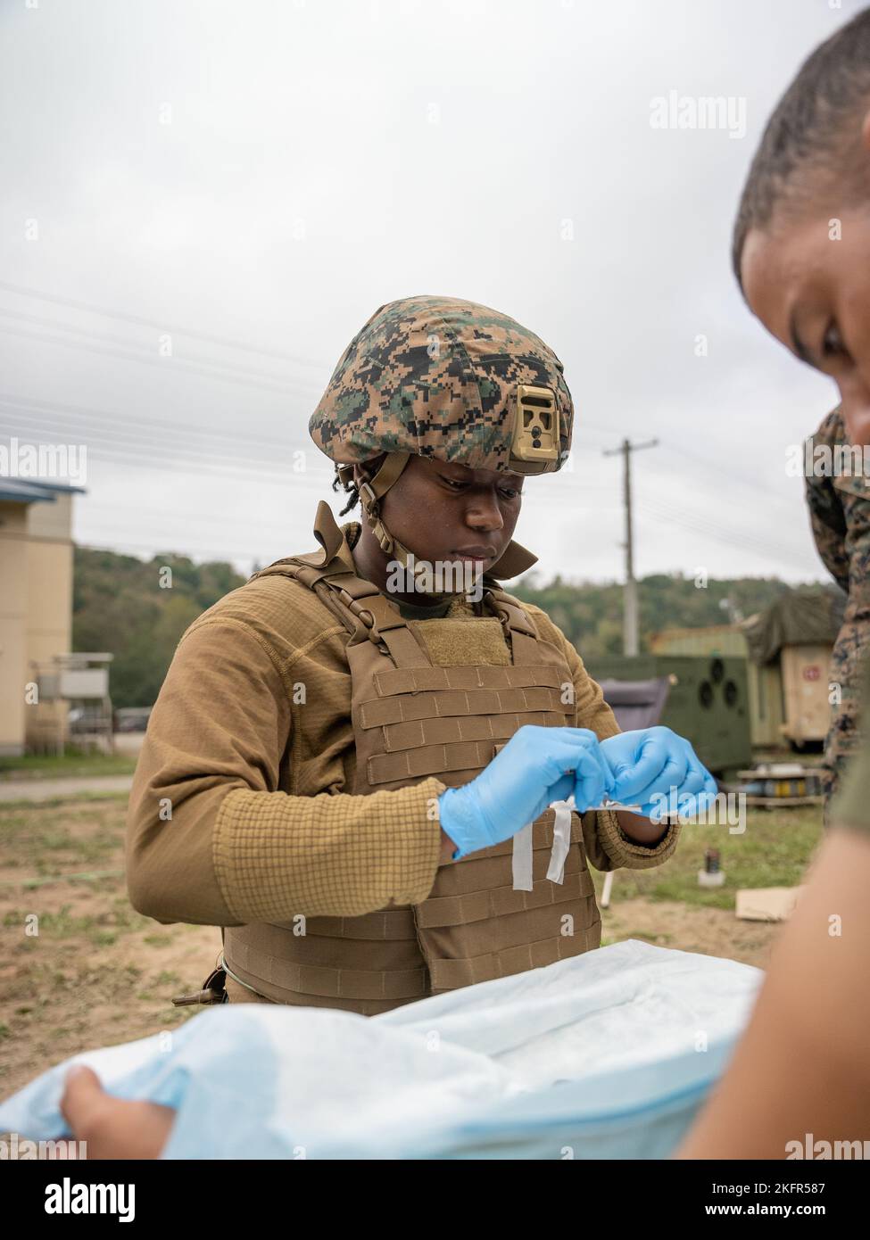U.S. Navy HN Andrea Davis a corpsman with 3rd Medical Battalion, 3rd ...