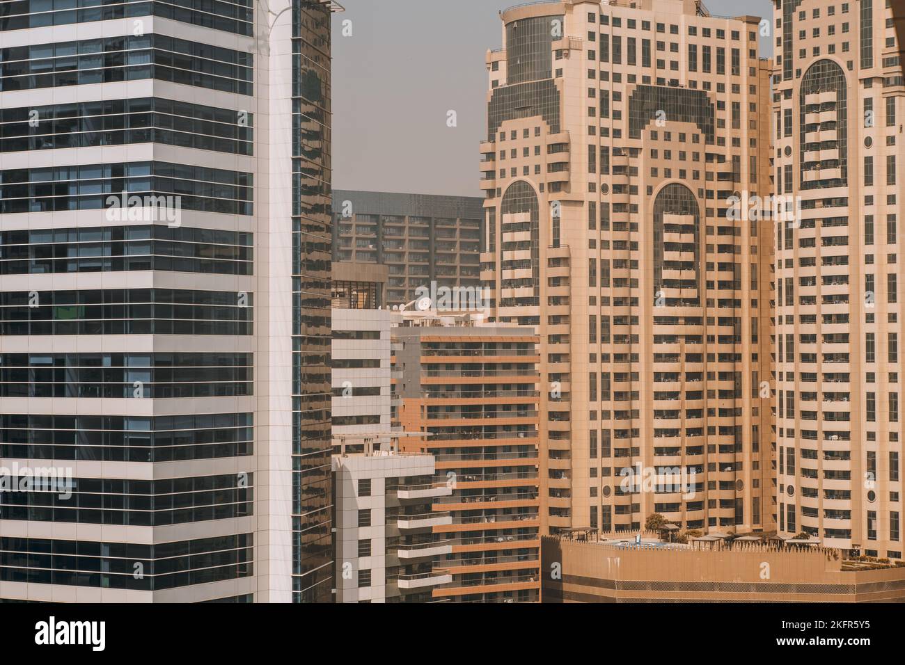 Close-up view from high above on the facades of huge residential high ...