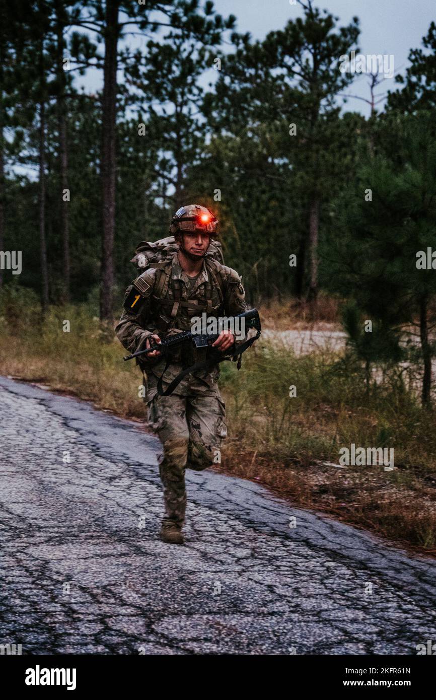 Spc. Samuel E. Alvarez, representing the U.S. Army Forces Command, runs ...