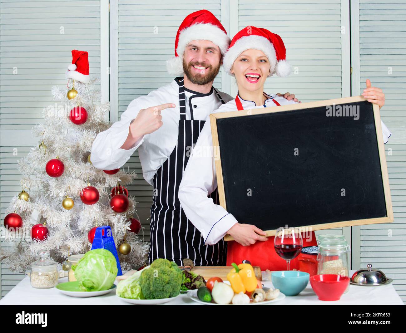 Couple check list ingredients for christmas dinner. Christmas recipe ...