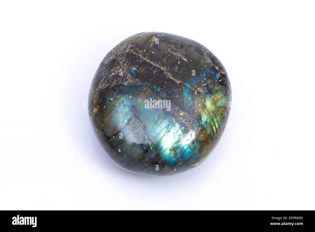 Natural gemstone labradorite isolated on white background. Dark gray ...