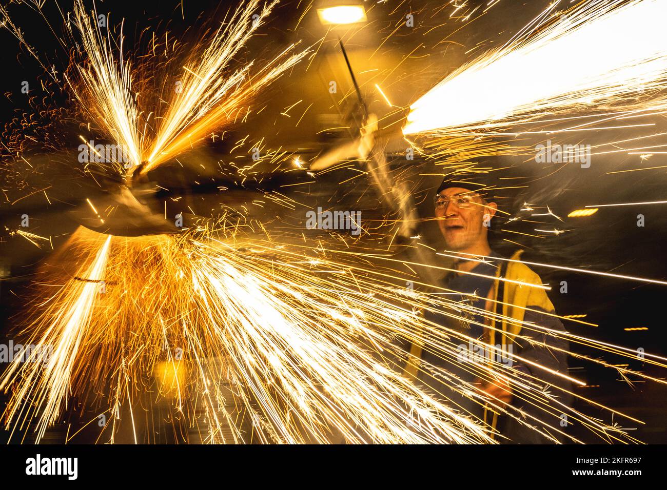 Barcelona, Spain. 19th Nov, 2022. A ‘Correfoc' (fire runner) sets off ...