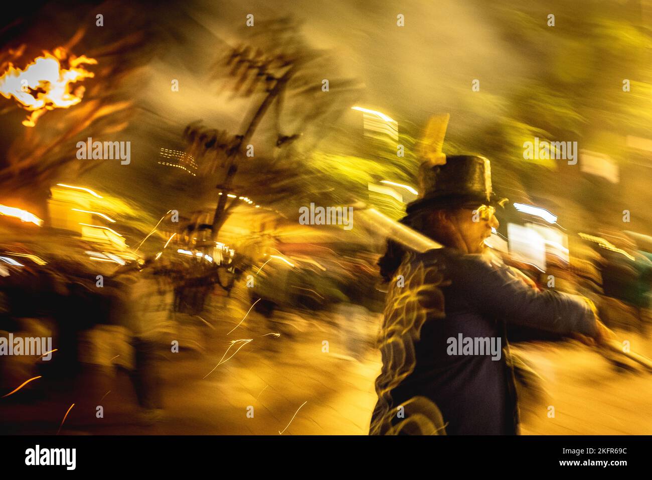 Barcelona, Spain. 19th Nov, 2022. A ‘Correfoc' (fire runner) sets off ...