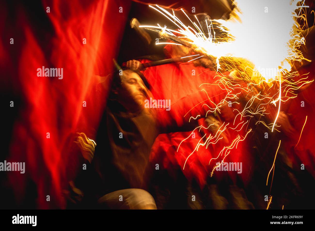 Barcelona, Spain. 19th Nov, 2022. A ‘Correfoc' (fire runner) sets off ...