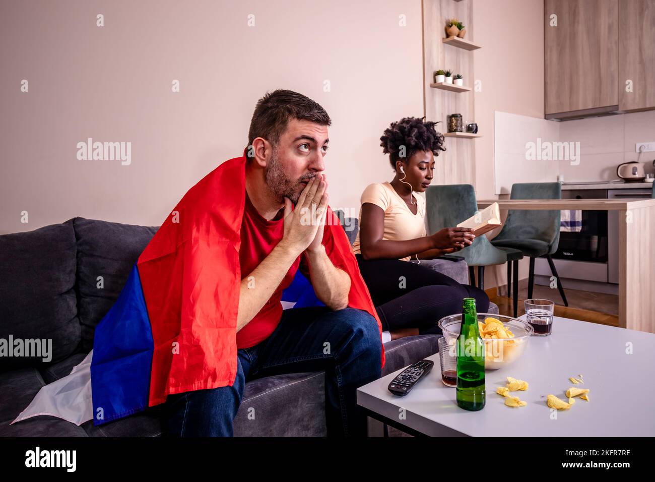 Bored fans at football game hi-res stock photography and images - Alamy