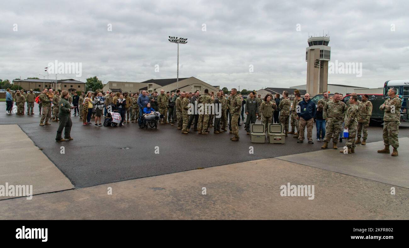 Family, fellow squadron and other Team Dover members wait for deployed ...