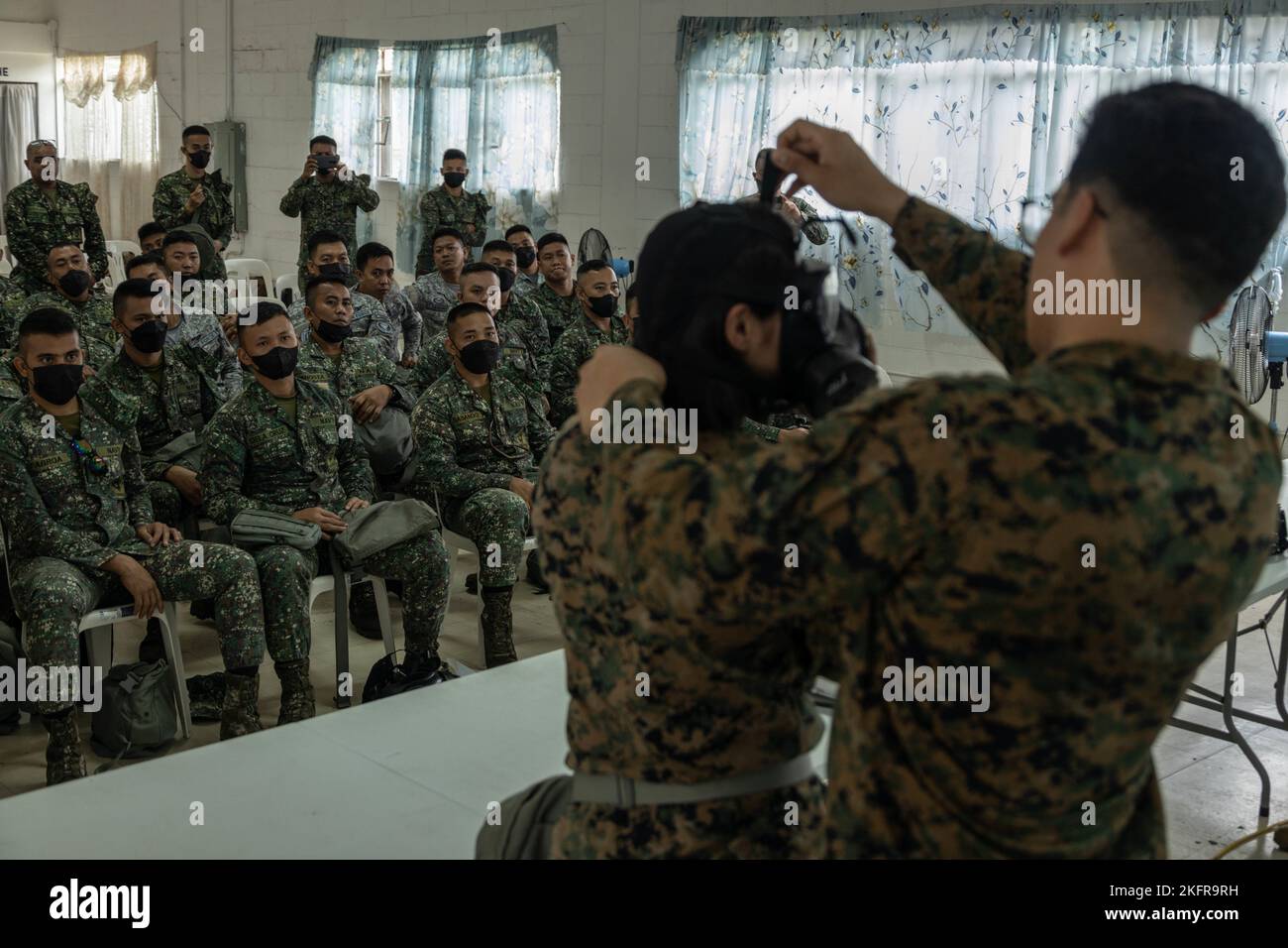 Philippine Marines and Airmen watch U.S. Marine Corps Cpl. Gabriela ...
