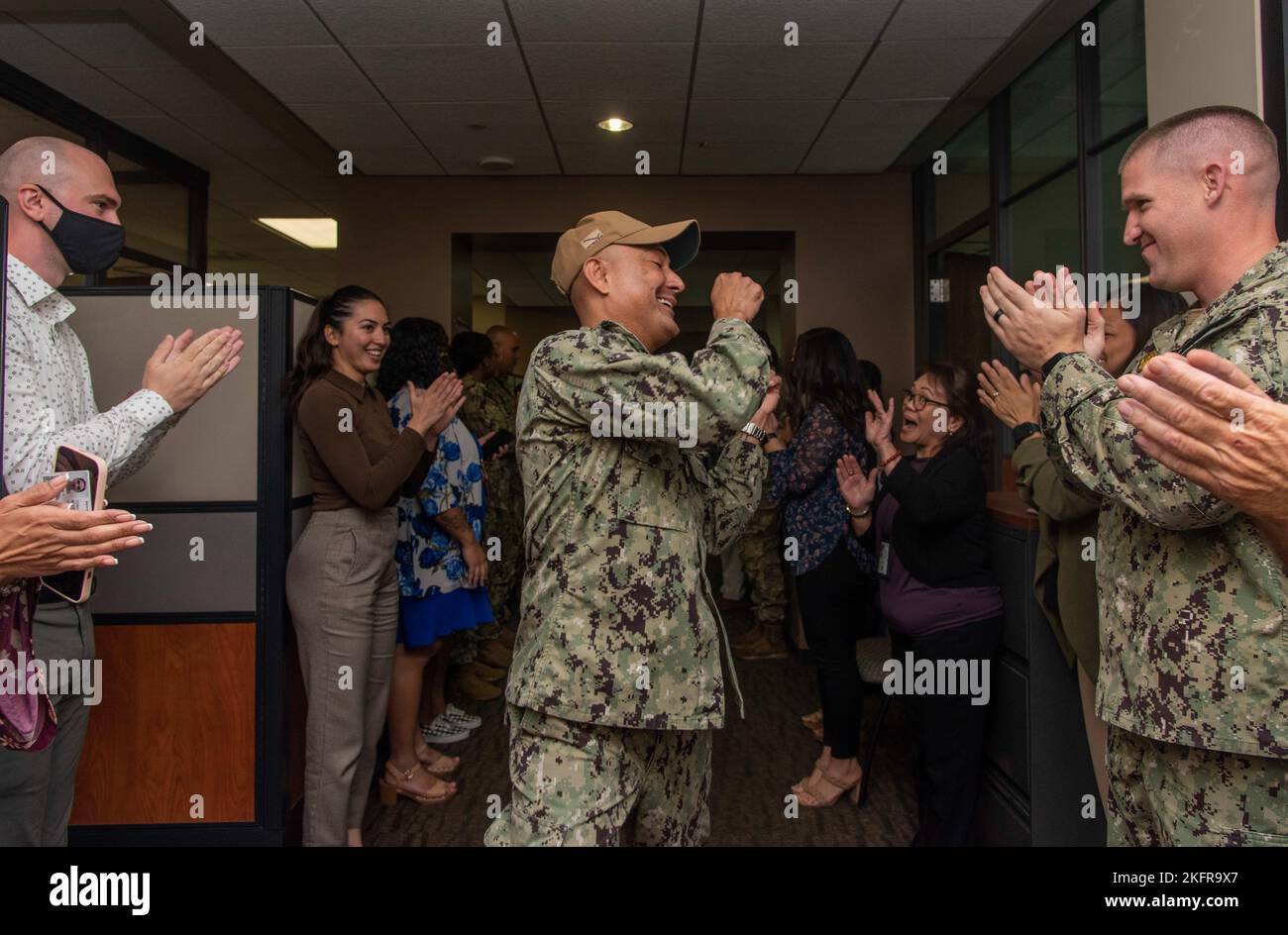 ASAN, Guam (Oct. 3, 2022) - Lt. Cmdr. Roger Blake receives an ovation ...