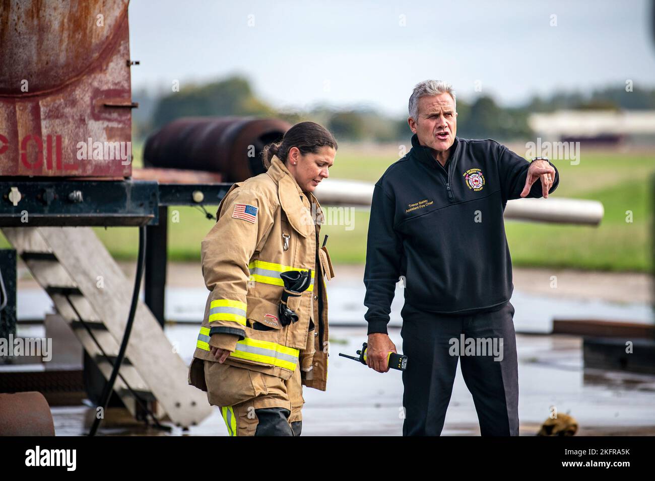 A firefighter from the 422d Fire Emergency Services speaks with Trevor ...