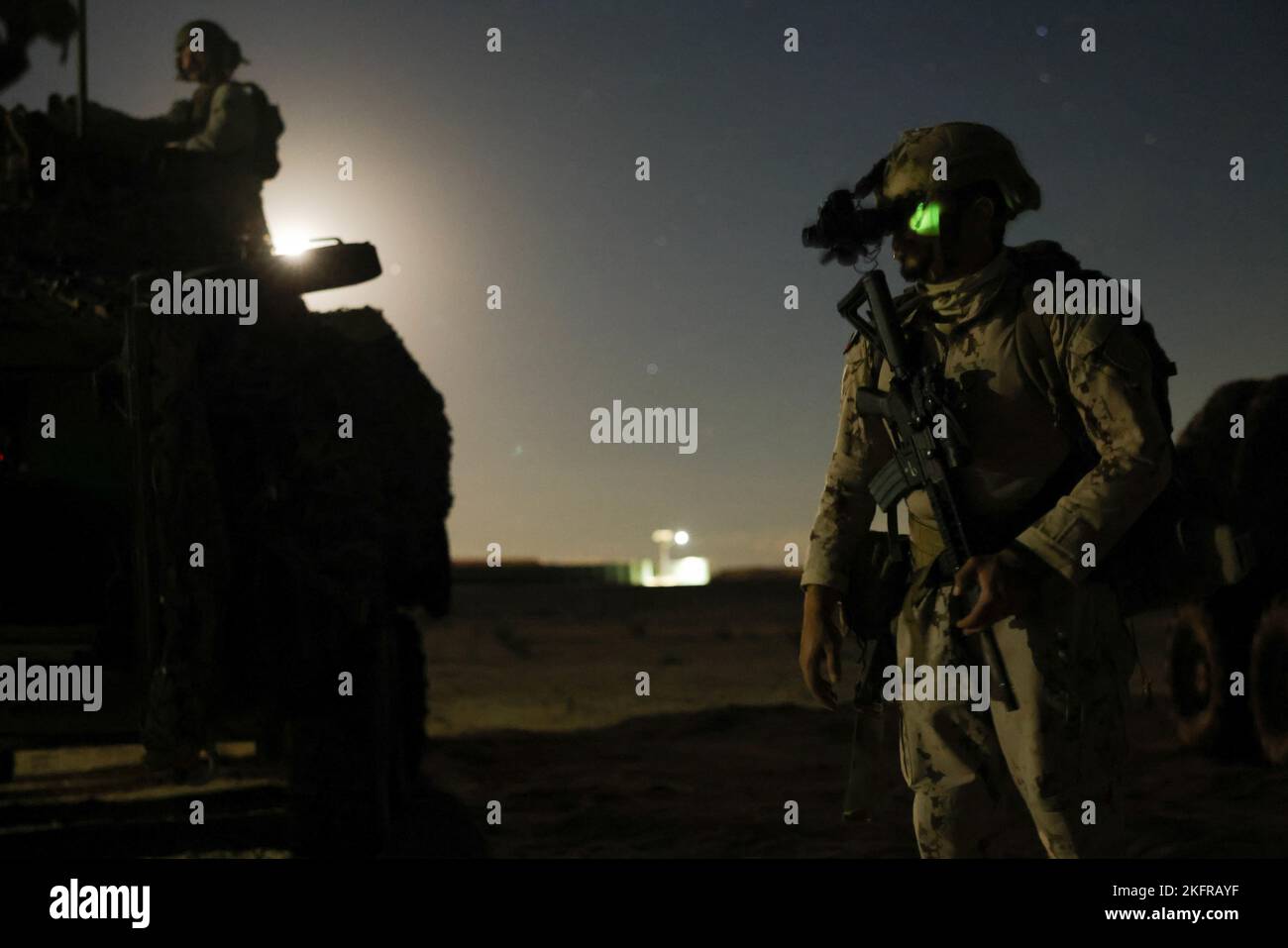 A United Arab Emirates soldier prepares for a night exercise with U.S ...
