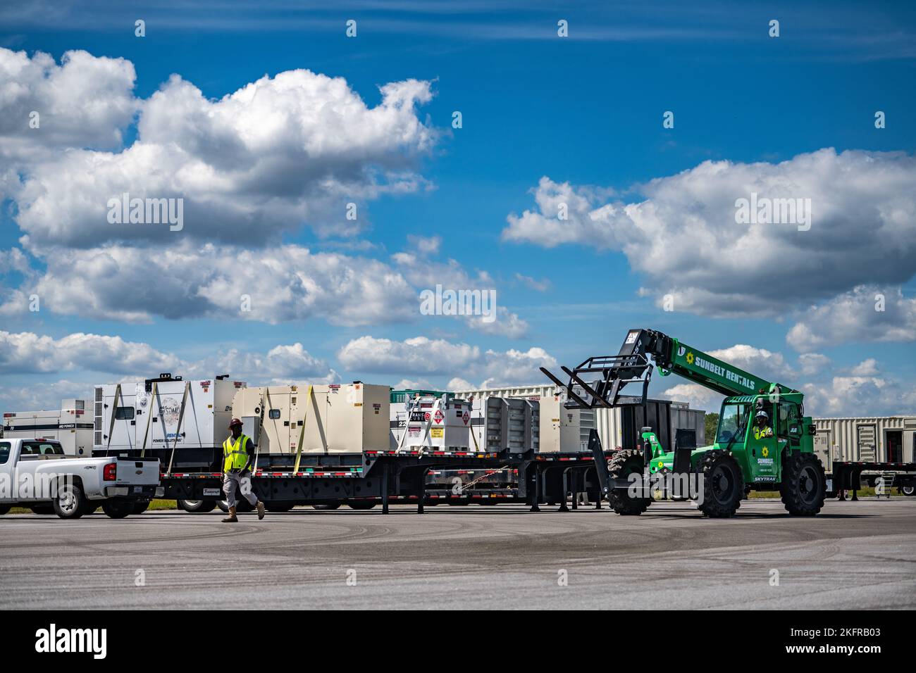 Personnel with the U.S. Army Corps of Engineers (USACE) conduct staging ...