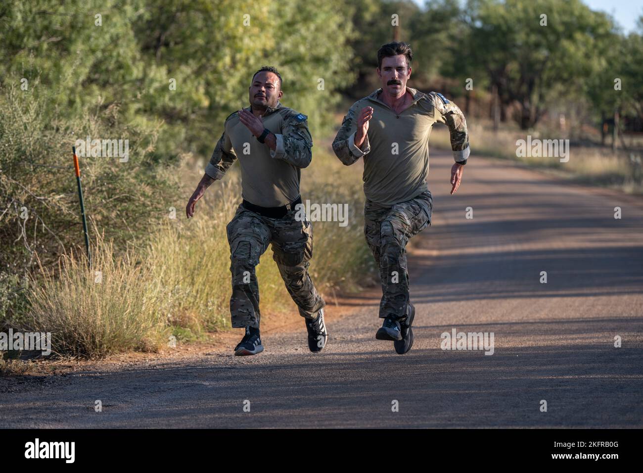 U.S. Air Force Airman 1st Class Kilian Fletcher, left, 9th Air Support ...