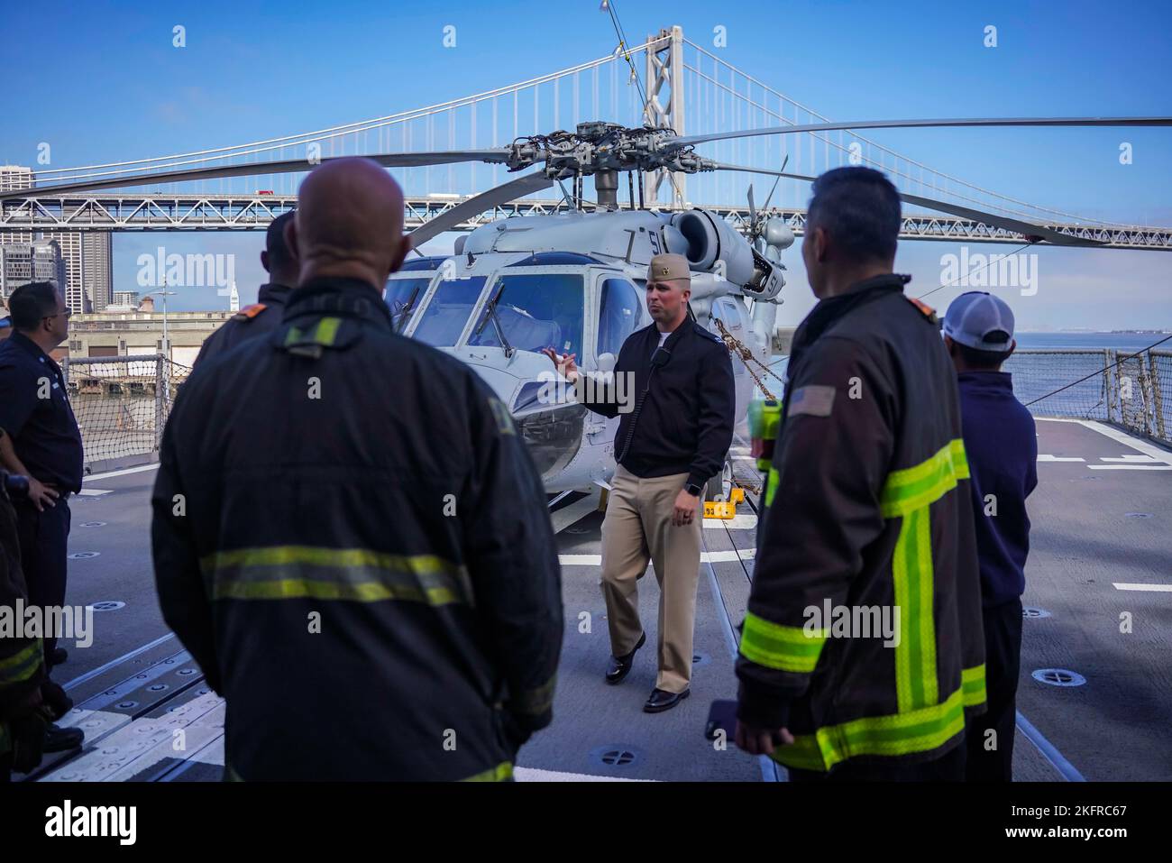 SAN FRANCISCO (Oct. 4, 2022) – Lt. Andrew Martzall, center, from ...